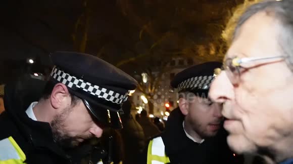 Piers Corbyn is detained by police as midnight strikes for 2024 before ...