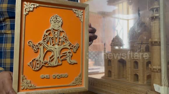 Indian artist creates wooden Hindu scripture by carving out each letter ...