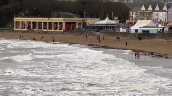 Strong winds batter Barry Island in south Wales as Storm Isha rolls in ...