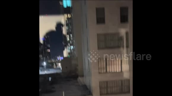 Startling shadow figure caught on camera in Los Angeles window ...