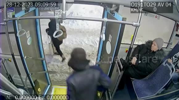 Passenger dragged along icy road after getting backpack stuck in bus ...