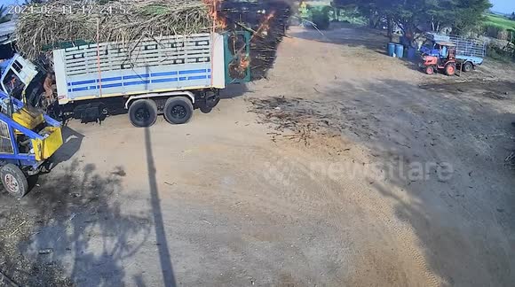 Kid sets fire to sugar cane stalks on back of truck causing chaos ...