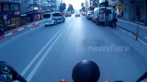 Motorcycle rider collides with police car in Antalya, Turkey - Buy ...