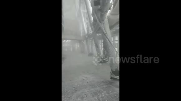 China's tallest skyscraper summit frozen over in spectacular icy ...