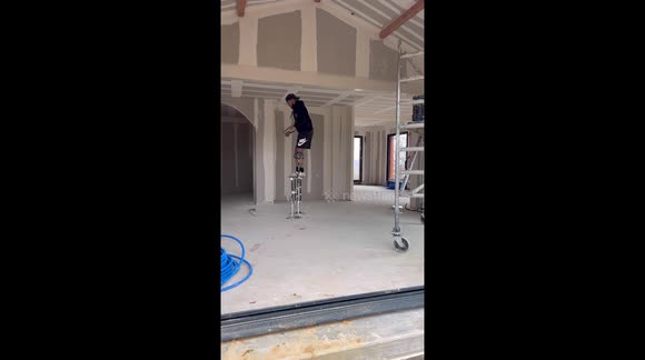Worker on Stilts Shows How to Pick up Dropped Tool - Buy, Sell or ...