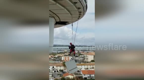 Firefighters Remove Lighthouse Cladding Endangering Public Road in ...
