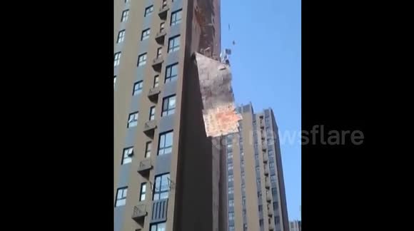 Wall falls off high-rise building in China - Buy, Sell or Upload Video ...
