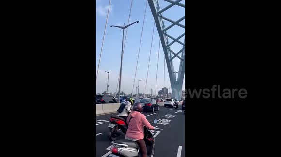 Motorcyclists sway as bridge shakes violently during Taiwan earthquake ...