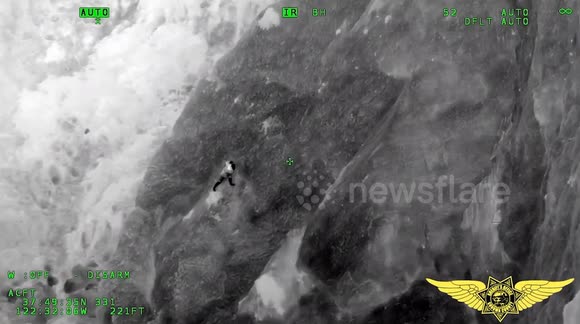 Police launch daring rescue to save man clinging onto cliff face after ...
