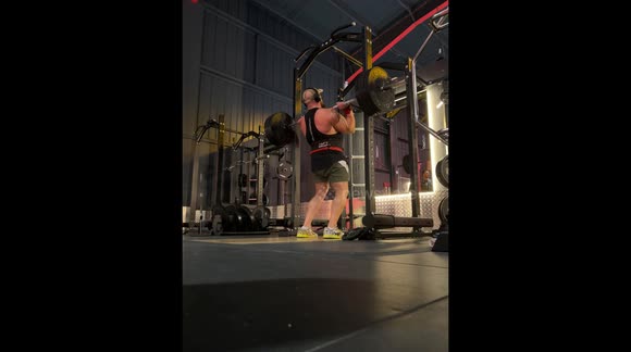 Weightlifter knocked head over heels as barbell crashes into shins ...