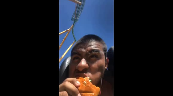 Daredevil challenges himself to eat CHEESEBURGER whilst on high-speed ...