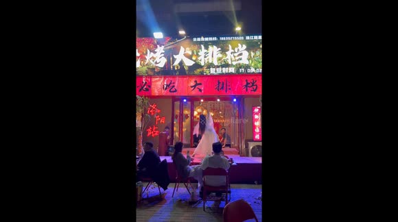 Chinese restaurant owner wows crowd with her traditional dance moves ...