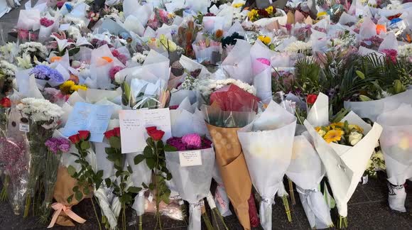 Pile of flowers continues to grow after 6 killed in stabbing attack in ...
