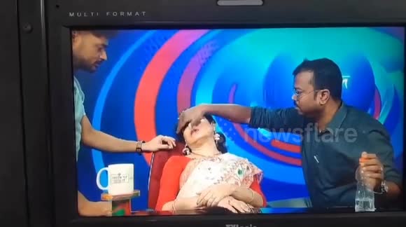 Indian TV anchor faints while reading live heatwave news - Buy, Sell or Upload Video Content ...
