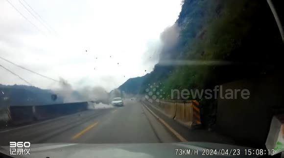 Terrifying moment car narrowly escapes as rocks fall from mountain in ...