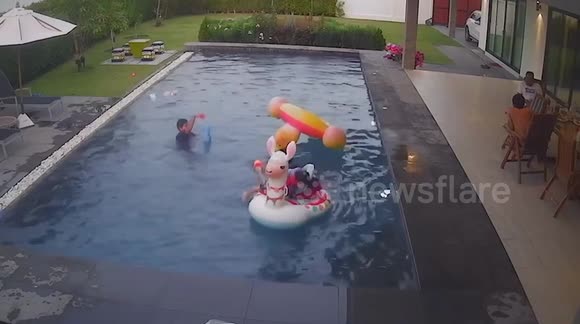 Drowning boy, 5, saved after falling from inflatable toy in swimming ...