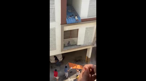 Residents came together to save a child that had fallen from a 4 storey ...