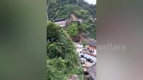 Landslide crushes houses as terrified villagers flee for their lives ...