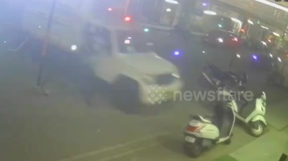 India: Speeding car crashes into restaurant glass - Buy, Sell or Upload Video Content with Newsflare