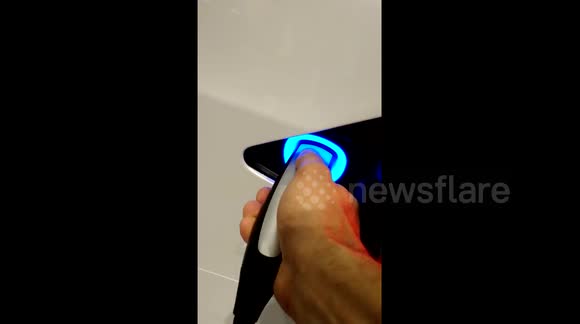 Hidden feature on Tesla cars that turns charging port into 'rainbow ...