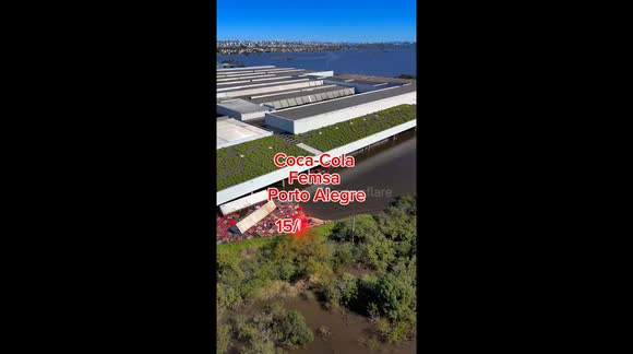 Dramatic drone footage reveals Coca-Cola factory submerged in Brazilian ...