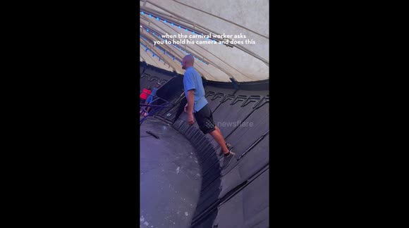 Carnival worker pulls off an amazing stunt on the carnival UFO ride ...