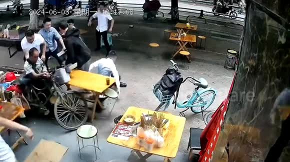 Out-of-control three-wheeler crashes into outdoor diners due to driver ...