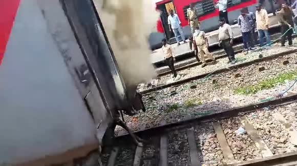 Smoke pours out of carriages as fire erupts on train in southern India ...