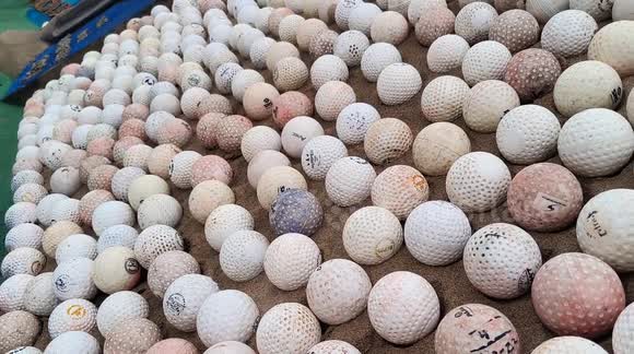Sand artist created five hundred balls installed on 20 ft long sand art ...