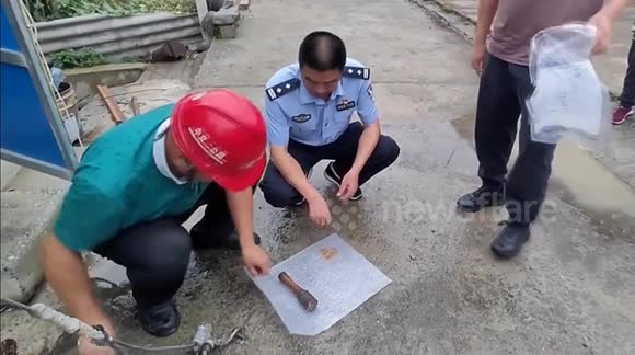 Elderly Chinese woman mistakes hand grenade for hammer, using it for ...