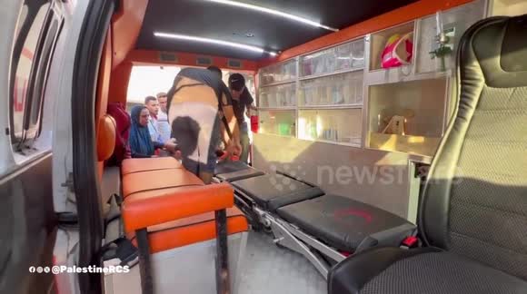 The Palestine Red Crescent teams transport injured people to the ...