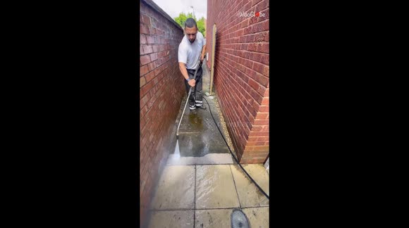 Pressure washing transforms a neglected alleyway into a clean space ...