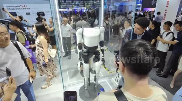 China: Tesla' Humanoid Robot at 2024 WAIC in Shanghai - Buy, Sell or ...