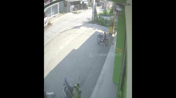 Moment of bullfighting accident between a large truck and a motorbike ...