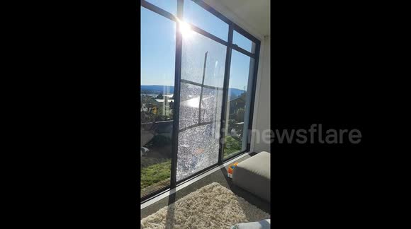 Oddly satisfying window shatter video goes viral with 2.1 million views ...