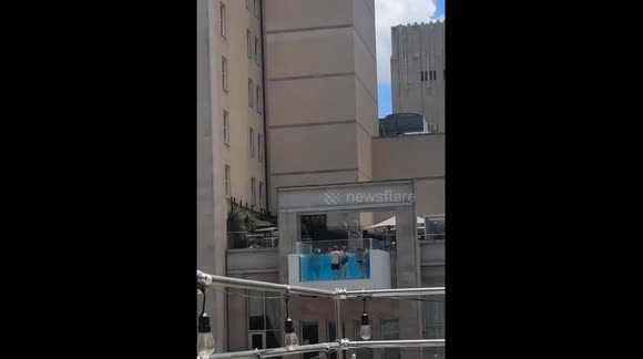 Guys at rooftop pool party unknowingly moon girls recording from ...