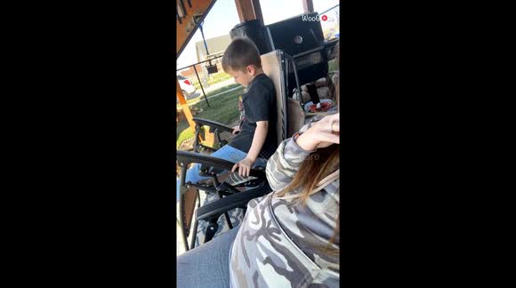 Funny backyard moment: Boy falls out of chair while relaxing with mom ...