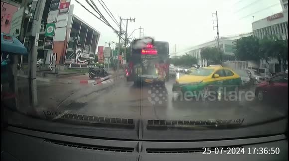 Driver road rages at a line of traffic that keeps coming and blocks the ...