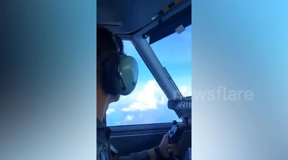 Chinese plane 'fires flares' at Philippines jet amid territorial ...