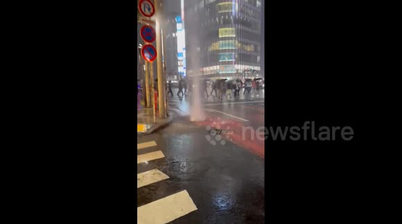 Water spurts out of drains as intense torrential rain causes flooding ...