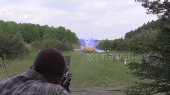 Parents reveal gender of baby to friends and family with a sniper rifle ...