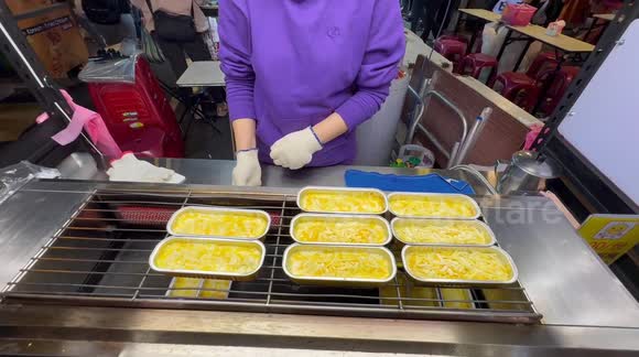 Hot durian covered in grilled cheese is a thing... and it's incredible ...