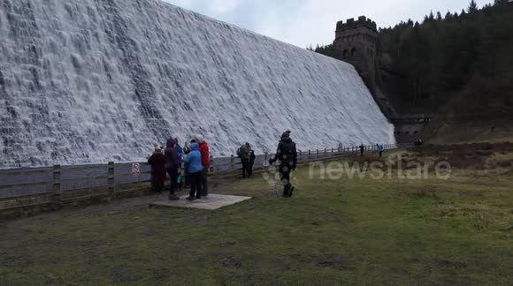 The famous iconic Derwent dam in Derbyshire UK flowing over. Dambusters ...