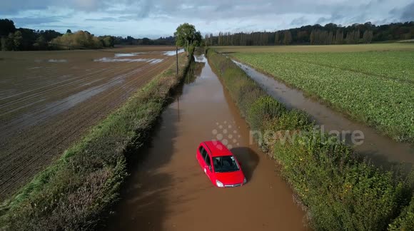Flooding cuts off drivers and homes after the River Teme burst its ...