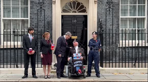 Keir Starmer buys poppy outside 10 Downing Street - Buy, Sell or Upload ...