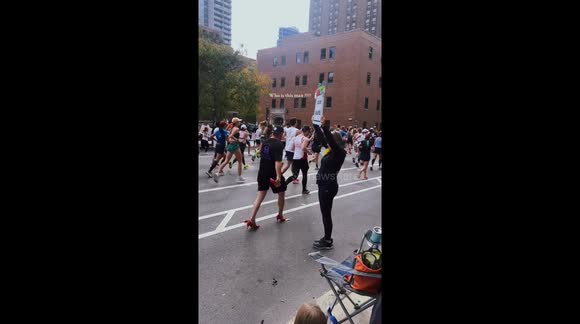 Man runs Chicago marathon in high heels to raise money for domestic ...