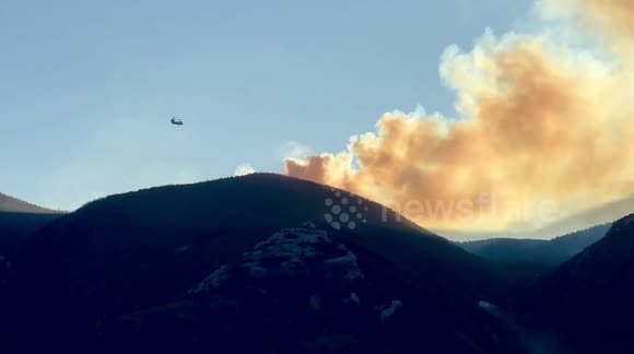 US: Intense Conditions Spark Elk Fire Flare-Up as Helicopter Tanker ...