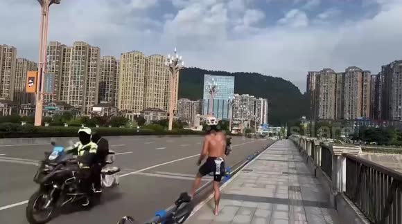 Cyclist detained by police after mooning fellow competitors in shocking ...