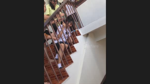 Schoolgirl gets stuck in wooden stair railings - Buy, Sell or Upload ...