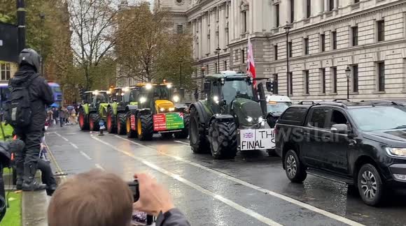 Tractors pass through Westminster as thousands. of farmers stage a ...